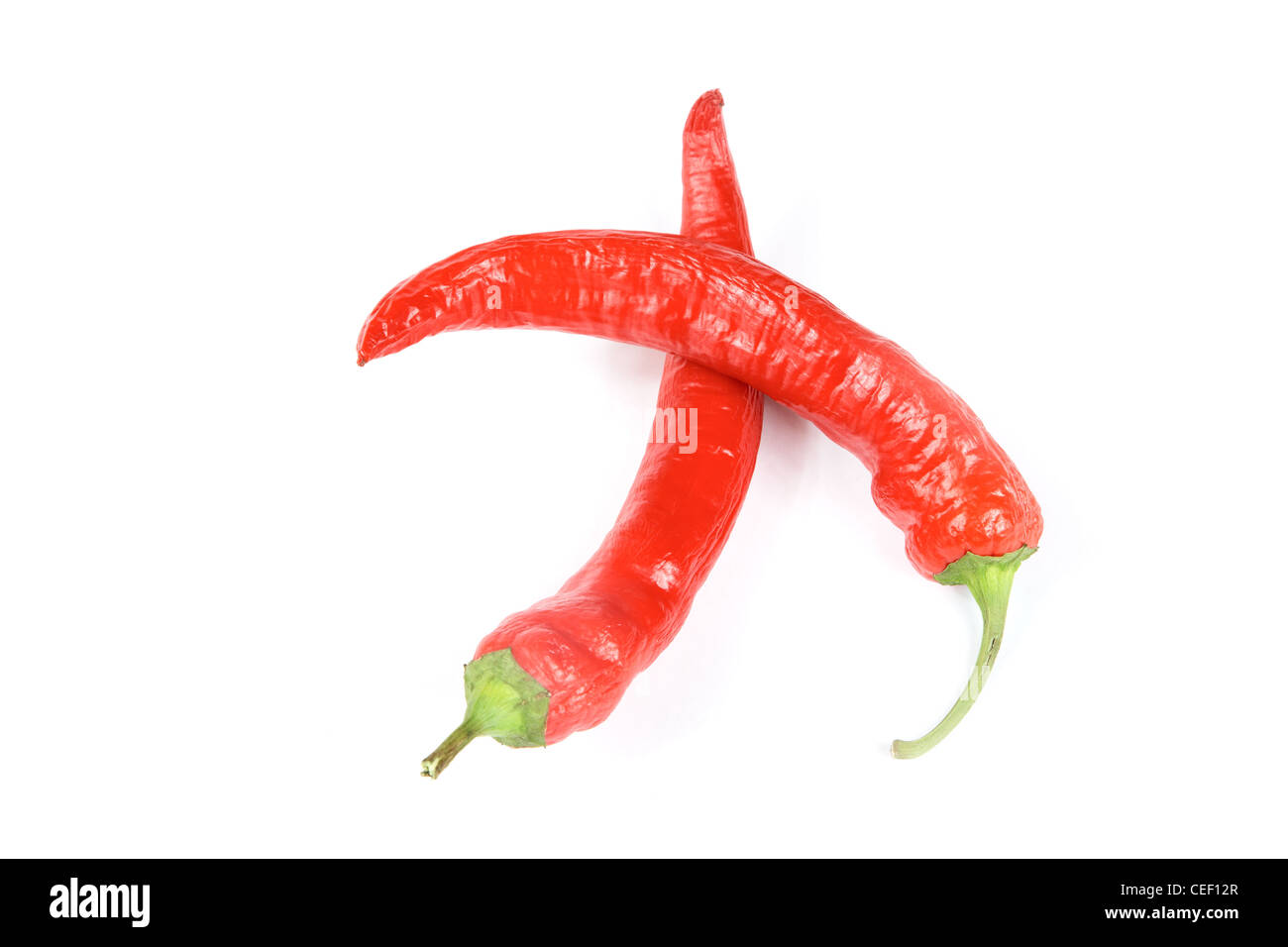 Pods of pepper on a white background Stock Photo - Alamy