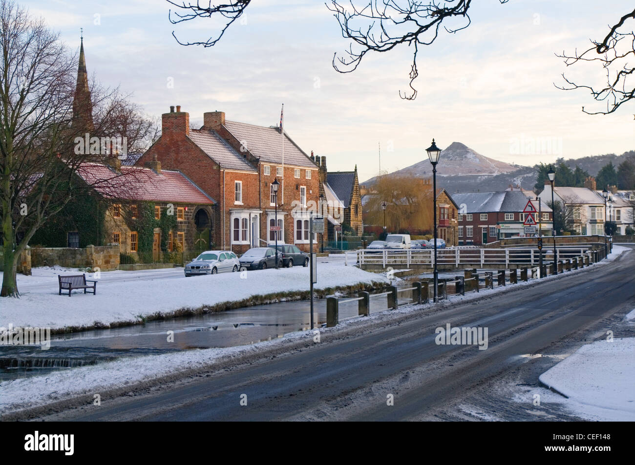 Village of Great Ayton and River Leven in snow, early morning, seen ...