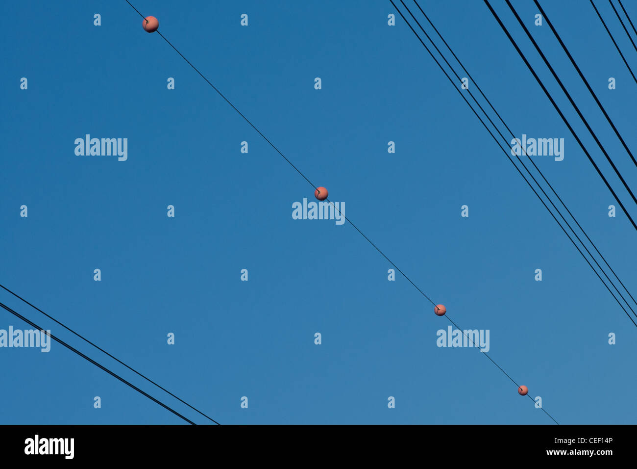 View of power lines aviation marker balls, near Welney, England Stock ...