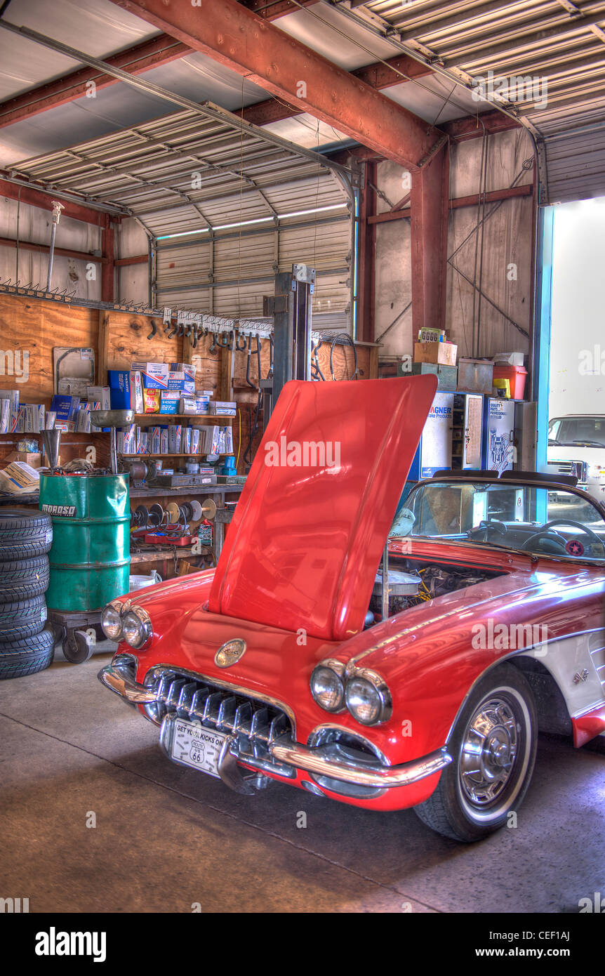 Vintage Red Chevrolet Corvette in garage Stock Photo - Alamy