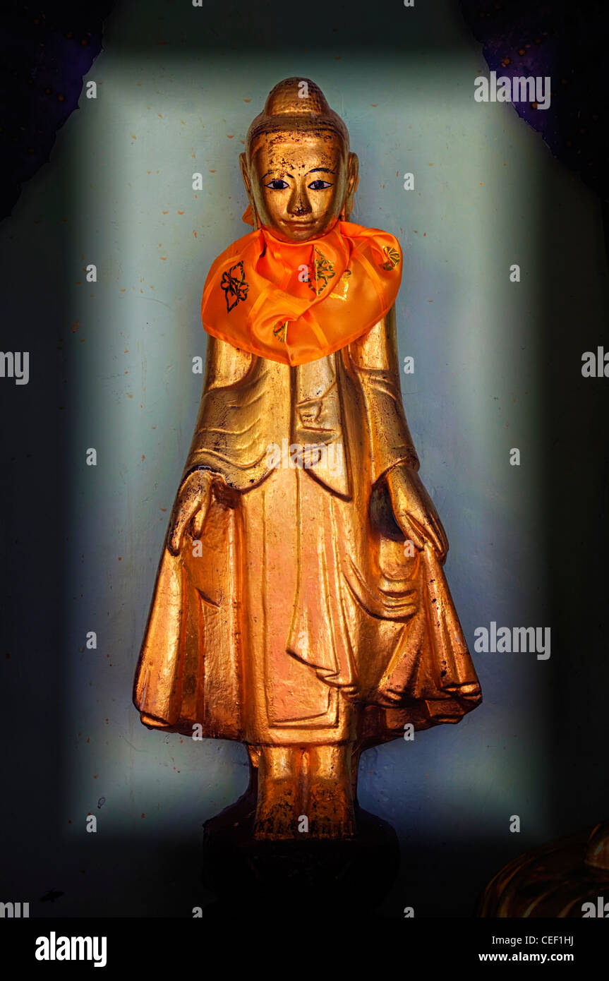 statue statues buddha buddhist gold orange yellow robe robes robed ...