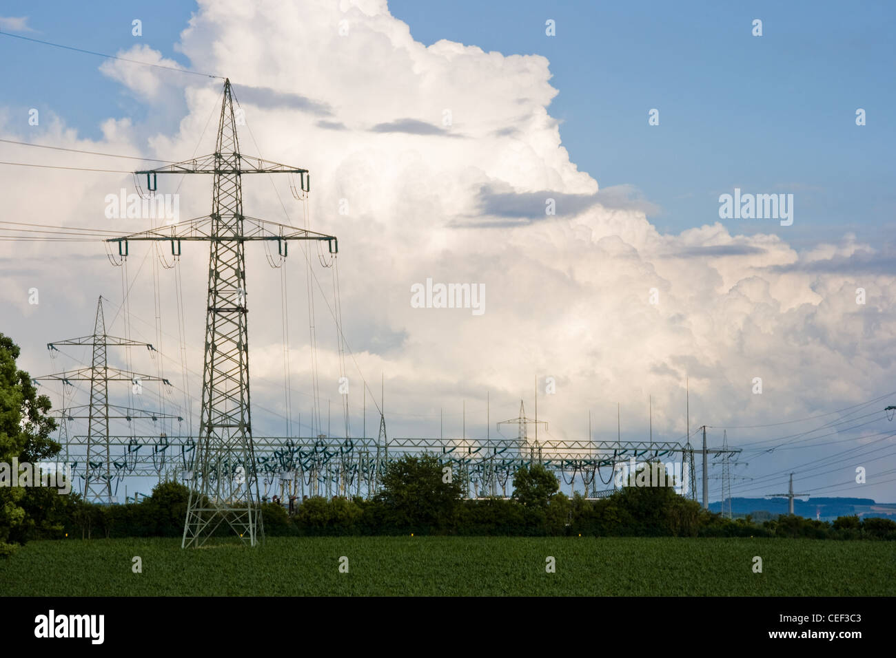 Big junction construction with cables of electricity grid on the hills ...