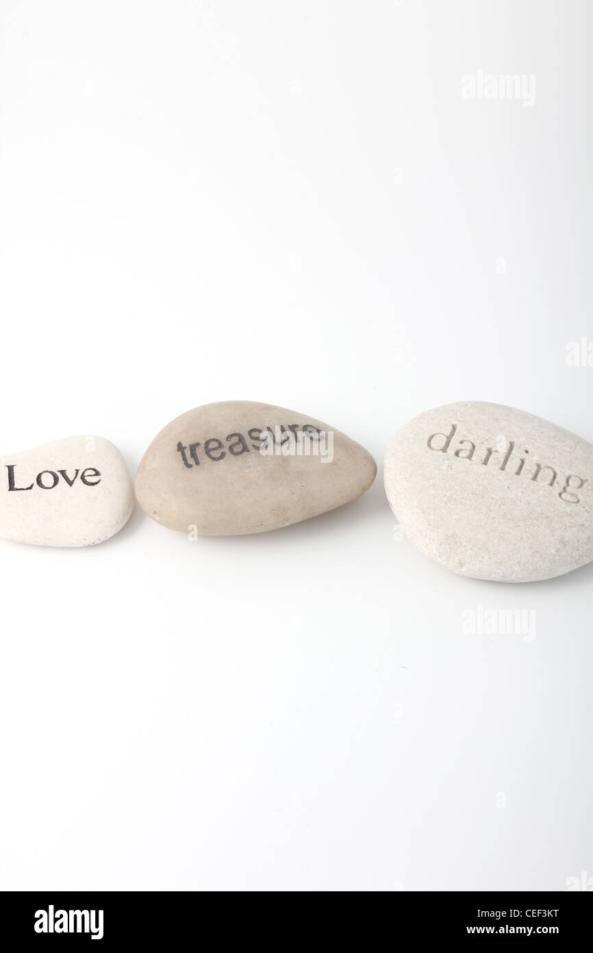 three stones with words Stock Photo - Alamy