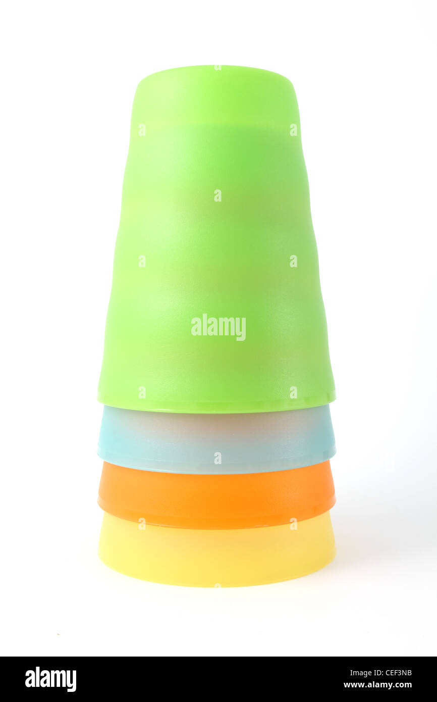 Stack of colorful plastic mugs Stock Photo - Alamy