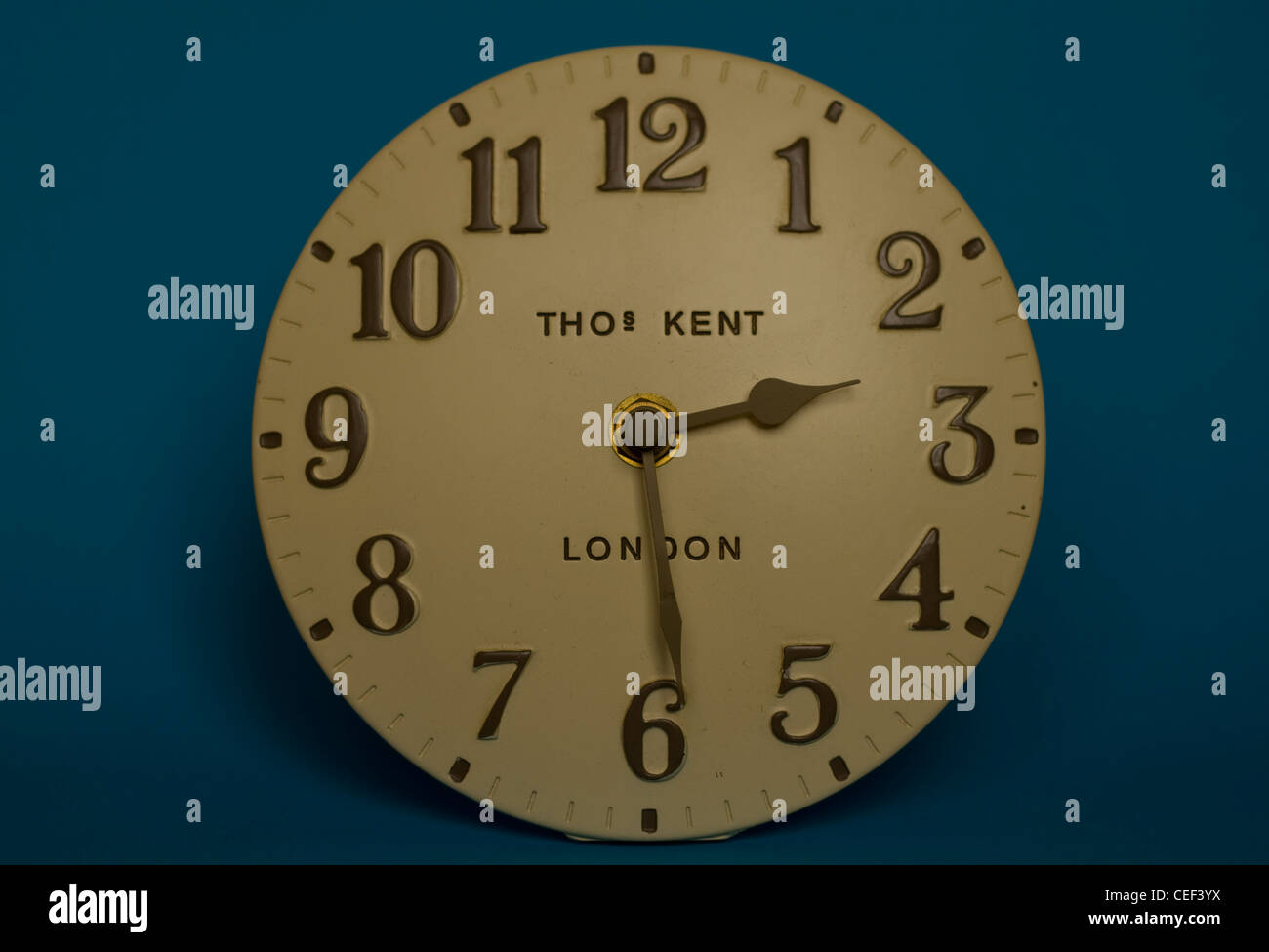 An old-fashioned analogue clock on a blue background reads 2.30 Stock ...