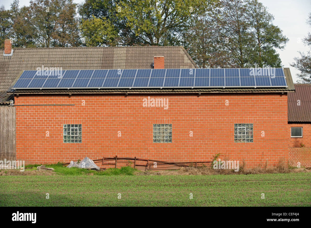 Solar energy panels fitted to agricultural buildings Stock Photo - Alamy