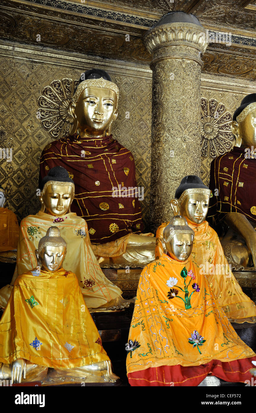 statue statues buddha buddhist gold orange yellow robe robes robed ...