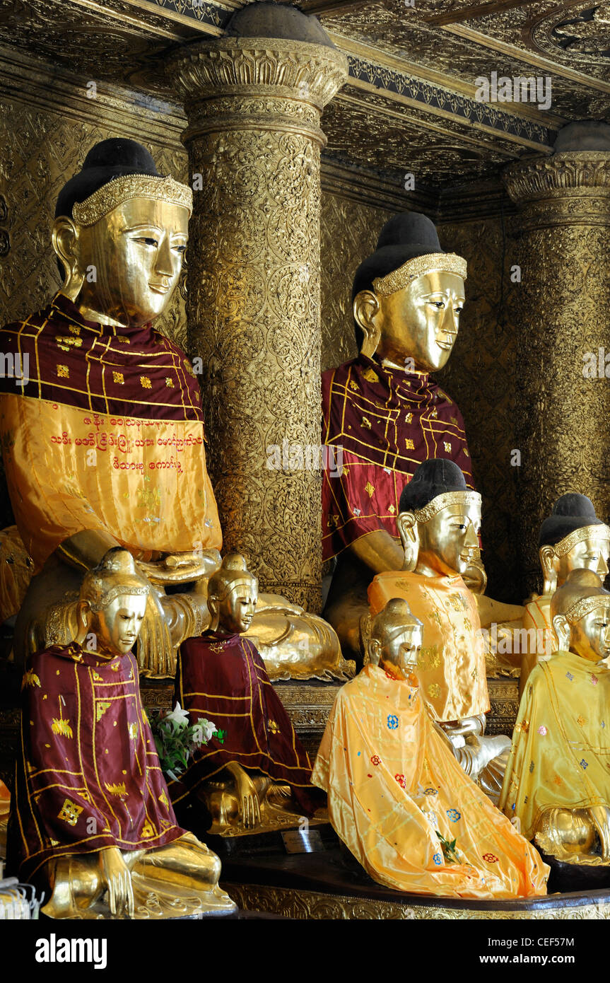 statue statues buddha buddhist gold orange yellow robe robes robed ...