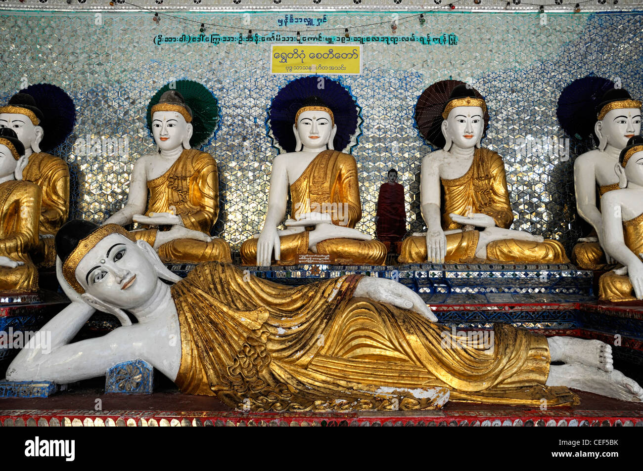 statue statues buddha buddhist gold orange yellow robe robes robed ...