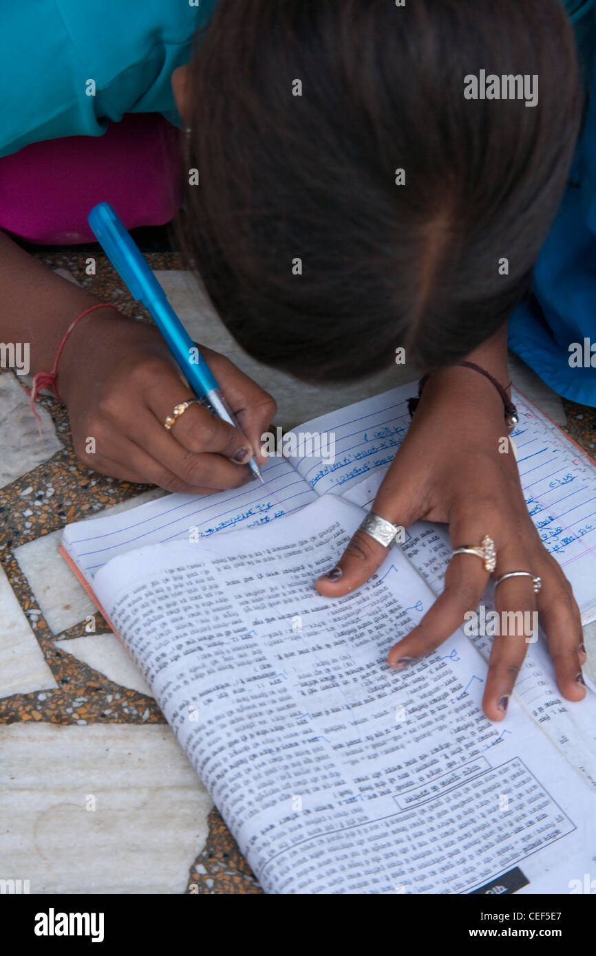 Indian girl doing homework hi-res stock photography and images - Alamy