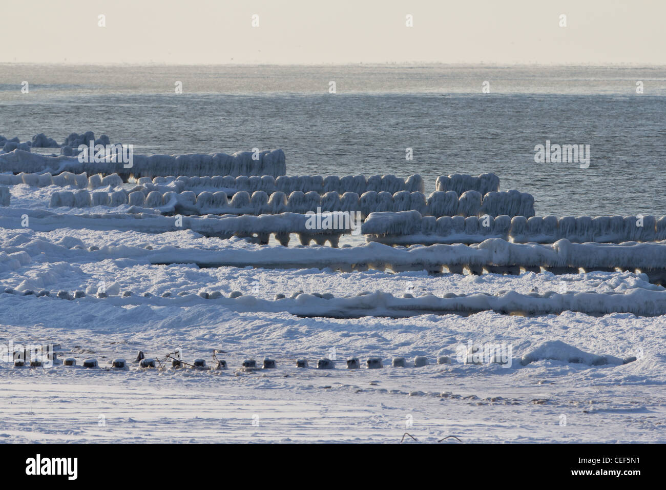Snow-covered beach in Niechorze, on the west coast of the Baltic Sea in ...