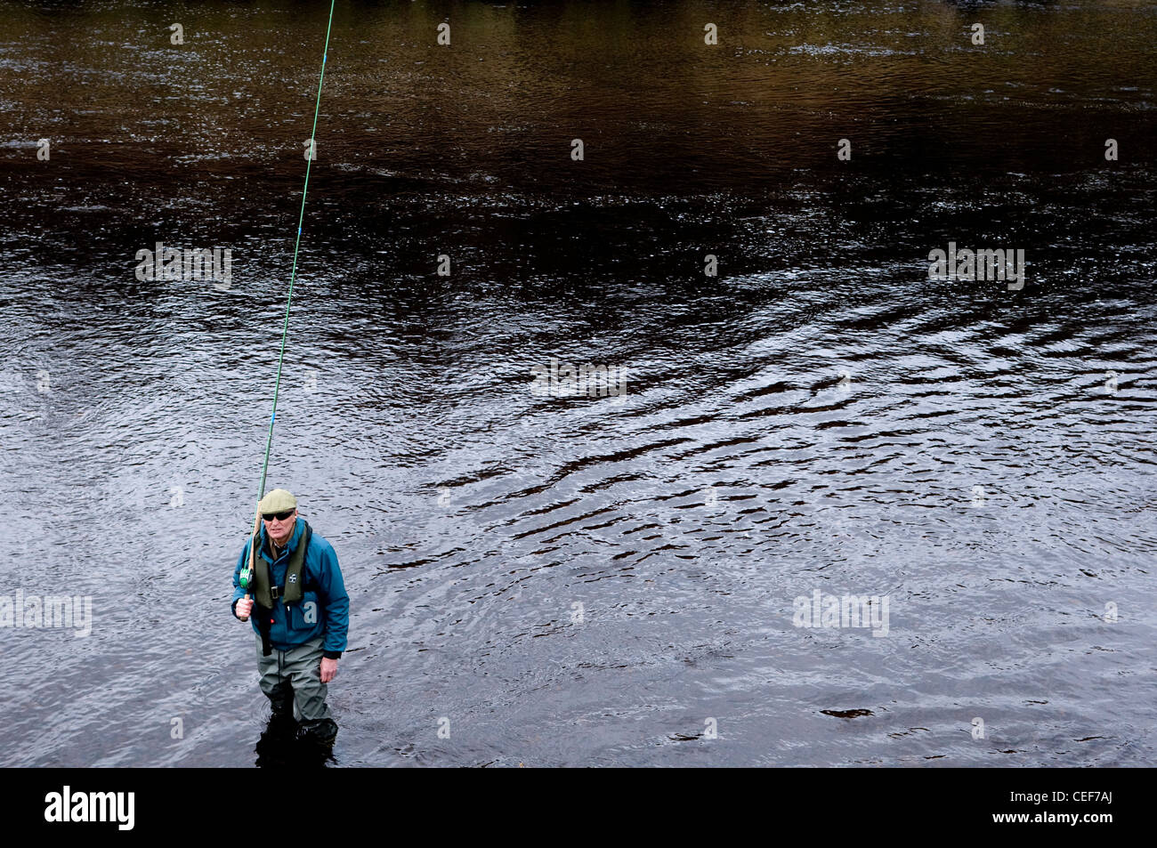 Man Salmon Fishing in the River Oykel, Sutherland, Scotland, UK Stock ...