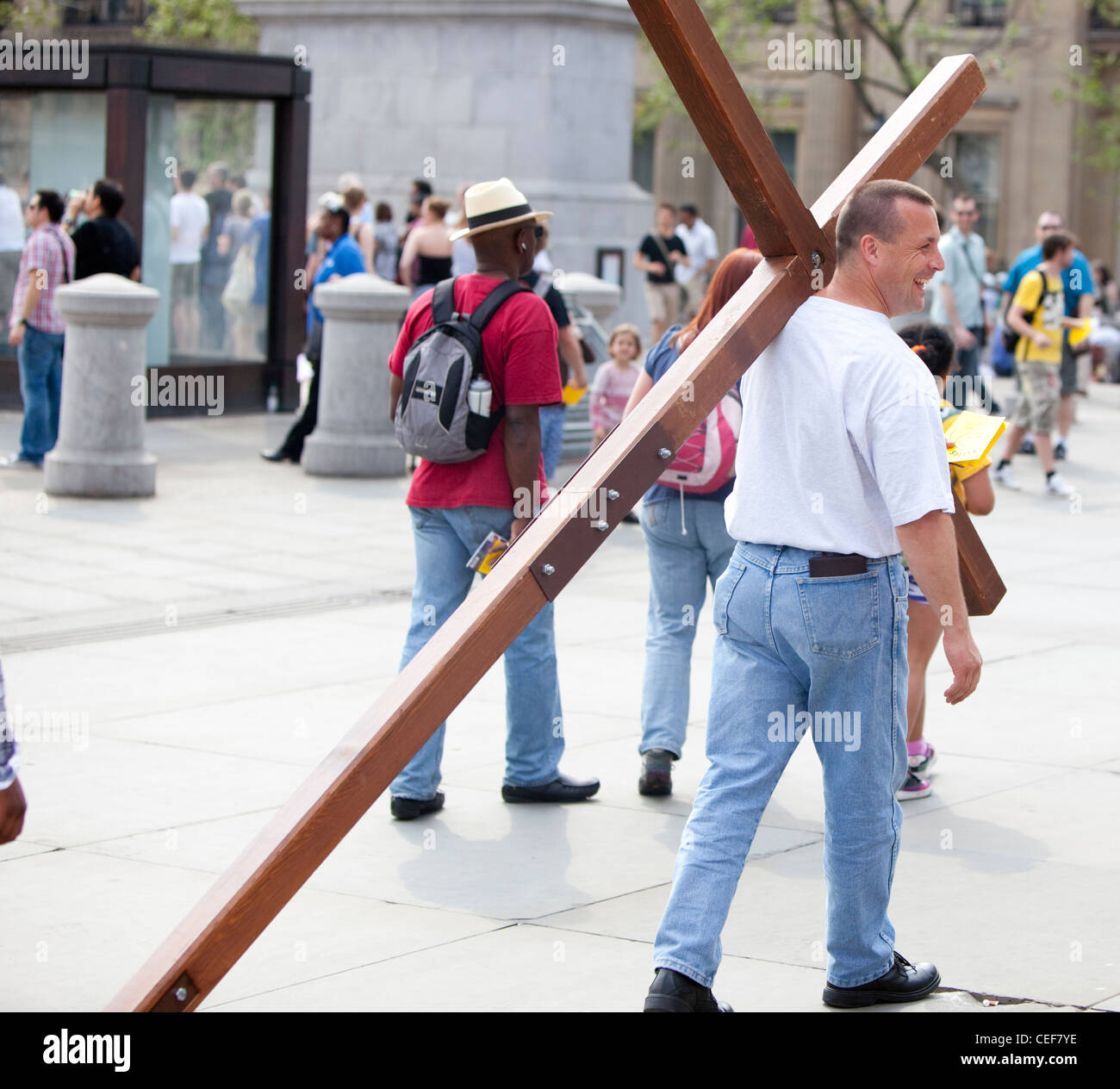 Man carrying a wooden cross in Easter, London, England, Uk Stock Photo ...