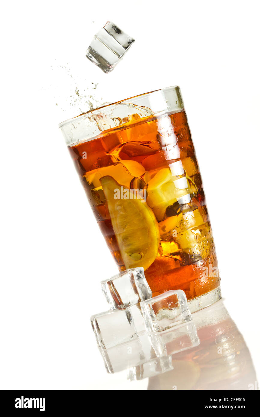 Cold tea, ice cube and splash Stock Photo - Alamy