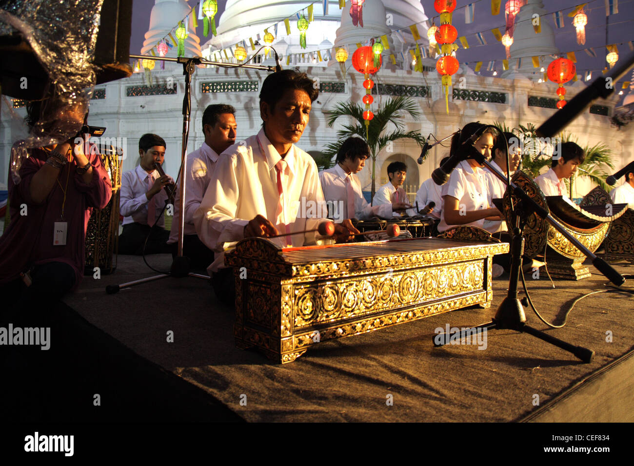 Thai musician performing a Ranat Ek (traditional Thai xylophone Stock ...