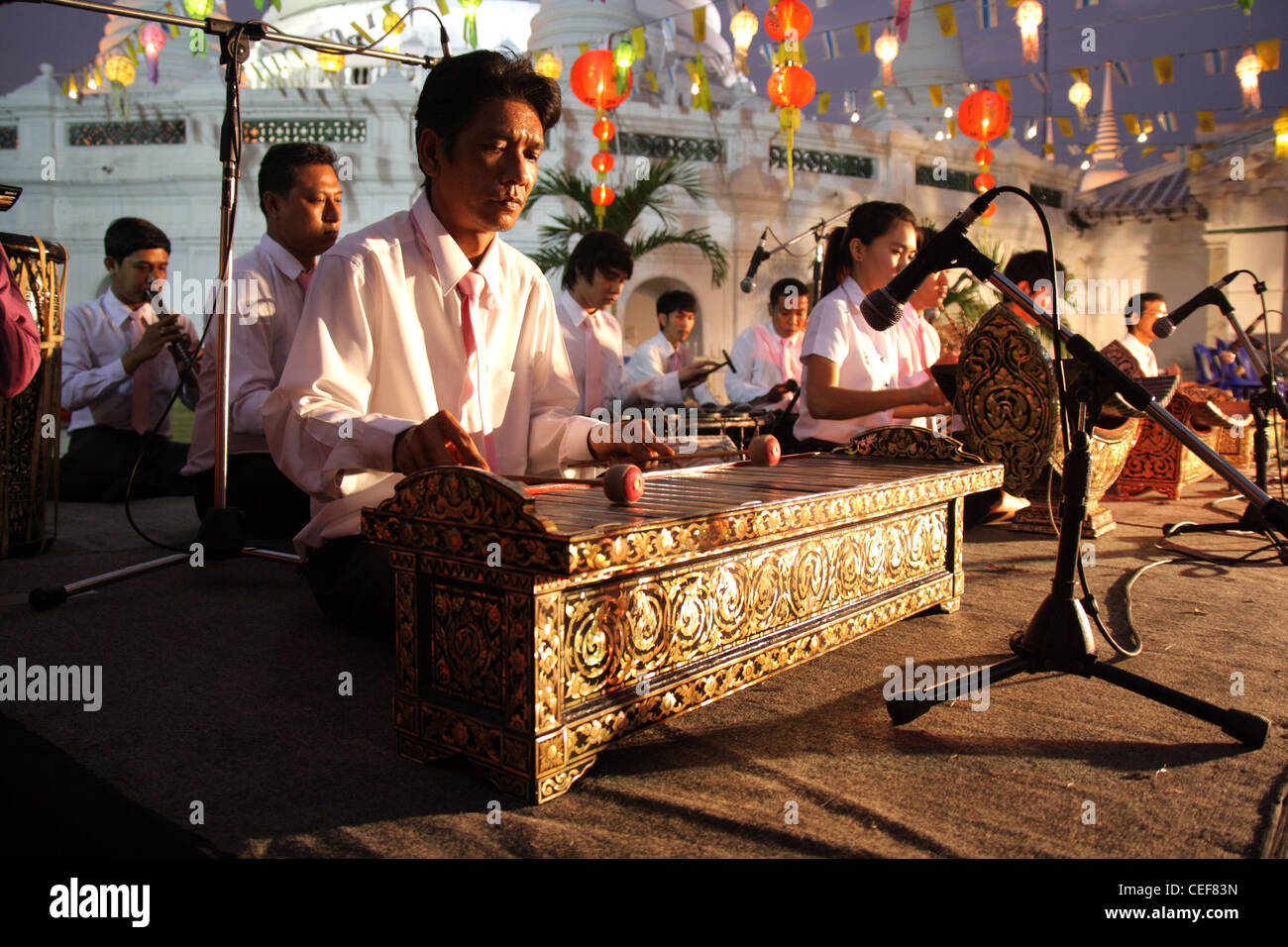 Thai musician performing a Ranat Ek (traditional Thai xylophone Stock ...