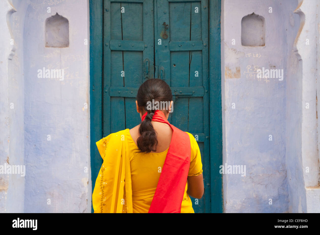 Indian woman with traditional architecture, Agra, India Stock Photo - Alamy