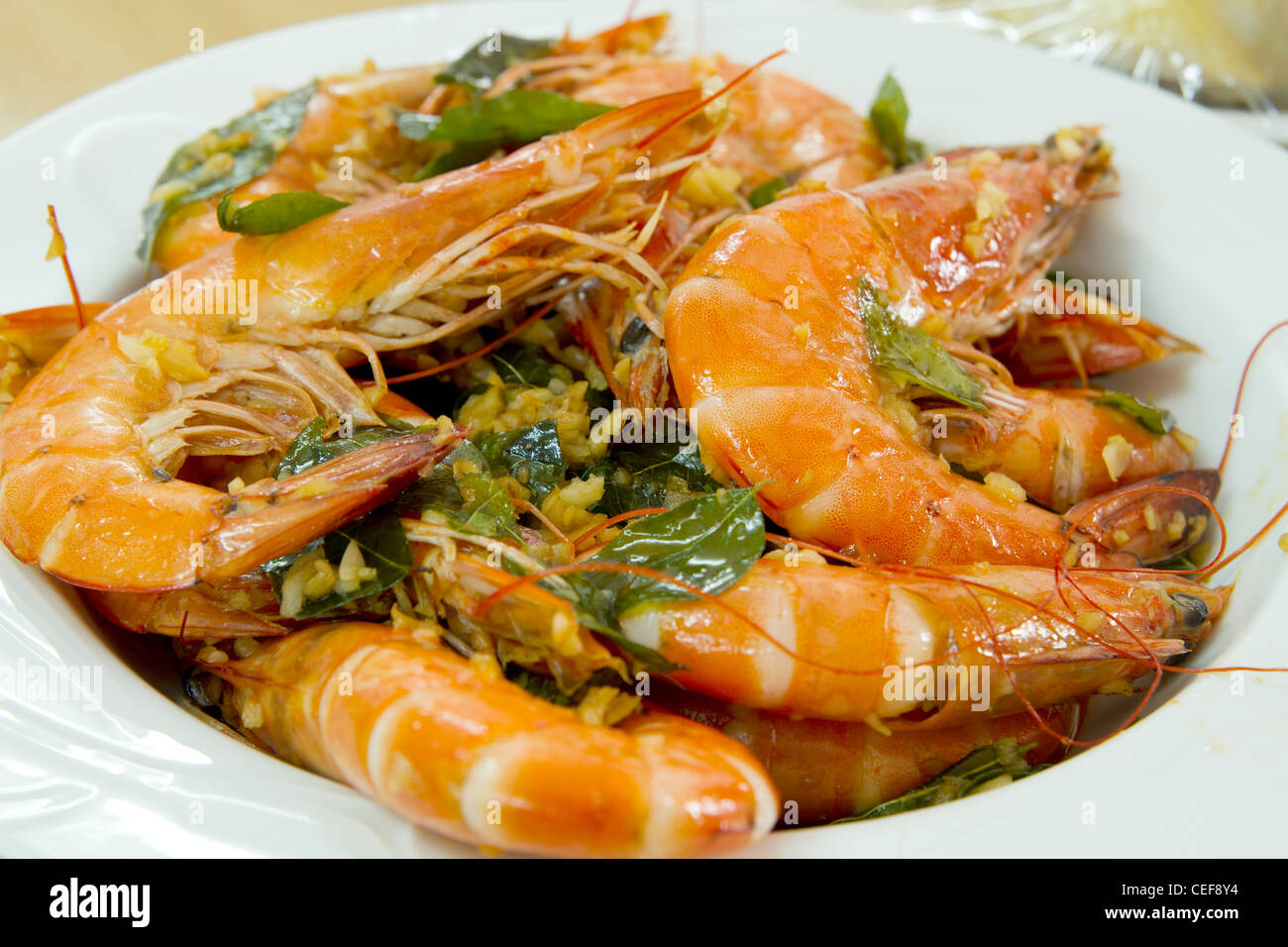 Cooked Prawns with Shell with Garlic and Curry Leaves Asian Dish Stock ...