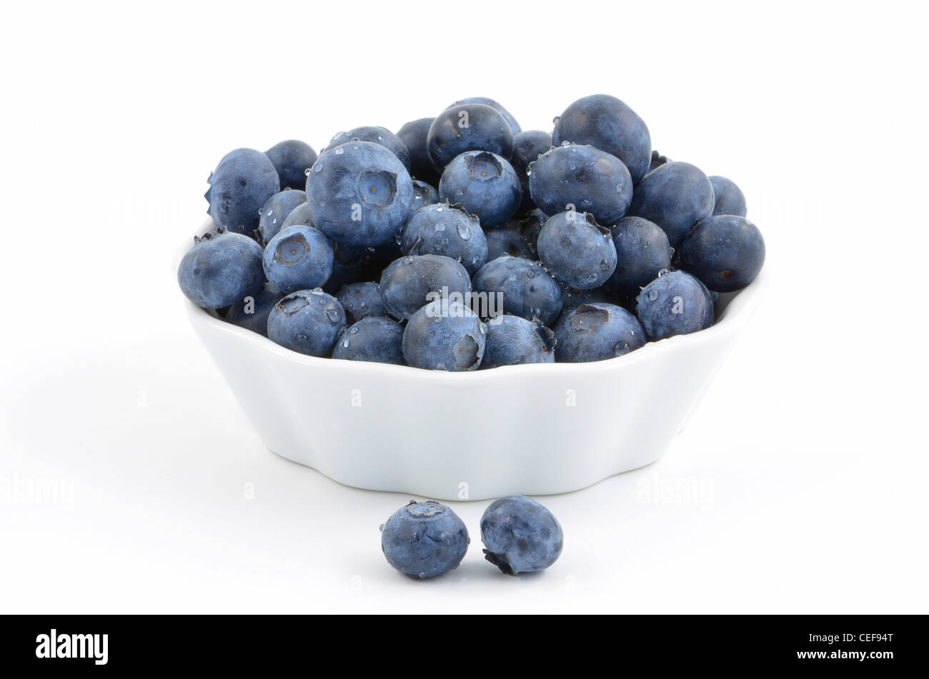 Fresh washed blueberries in small white dish Stock Photo - Alamy