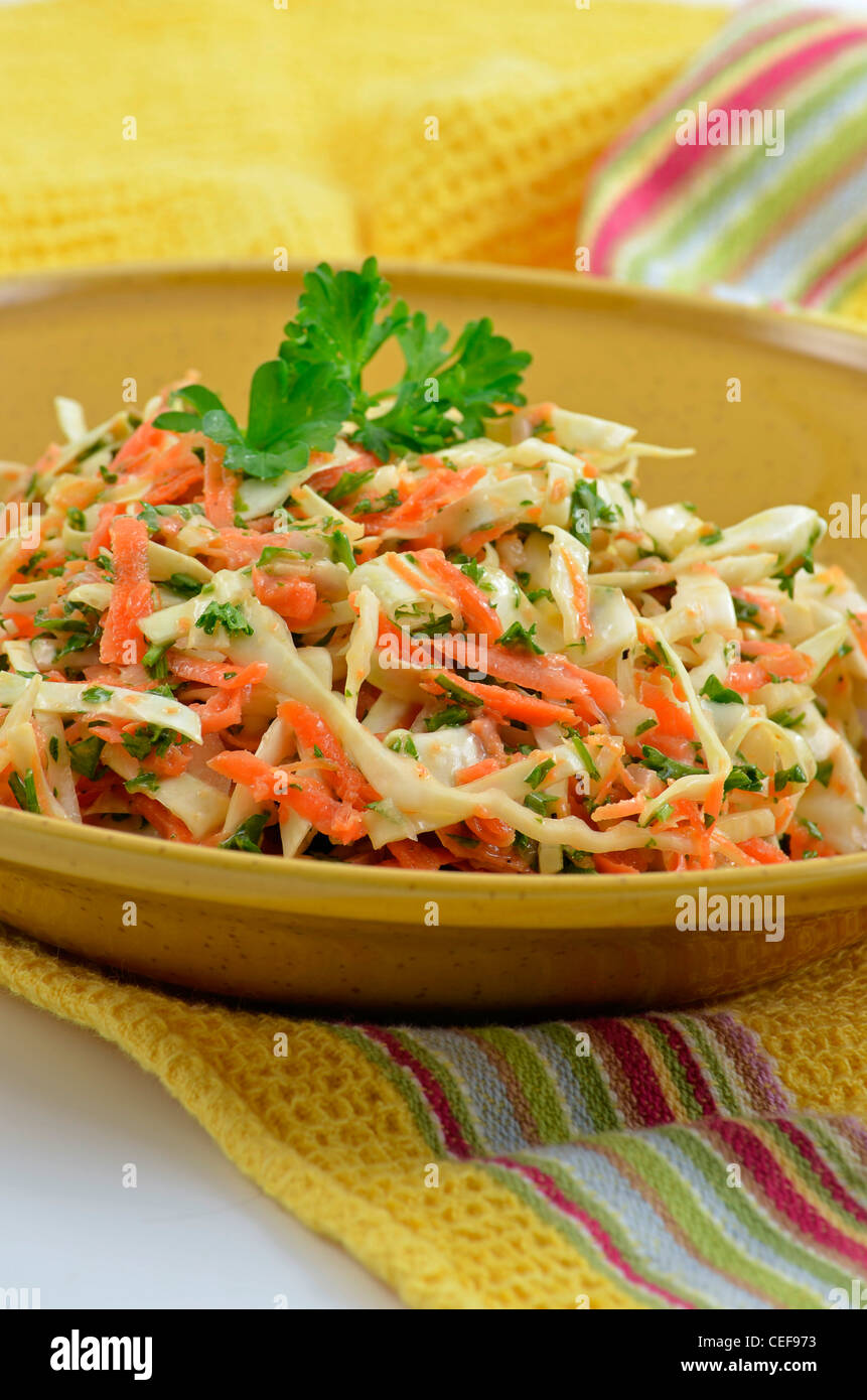 Creamy coleslaw with sweet cabbage, shredded carrots, chopped parsley ...