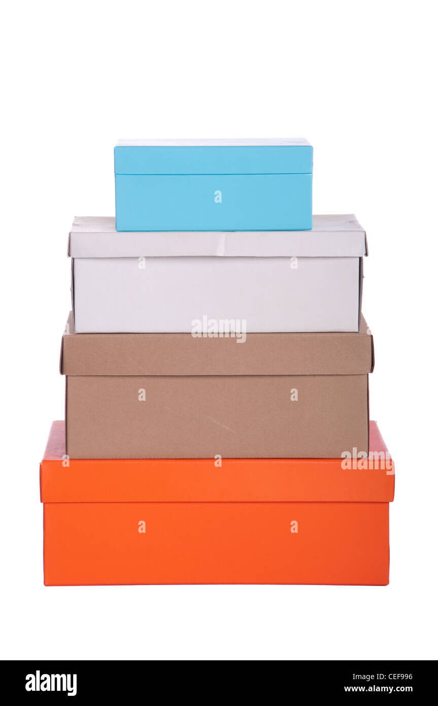 stack of colorful boxes isolated on white background Stock Photo - Alamy