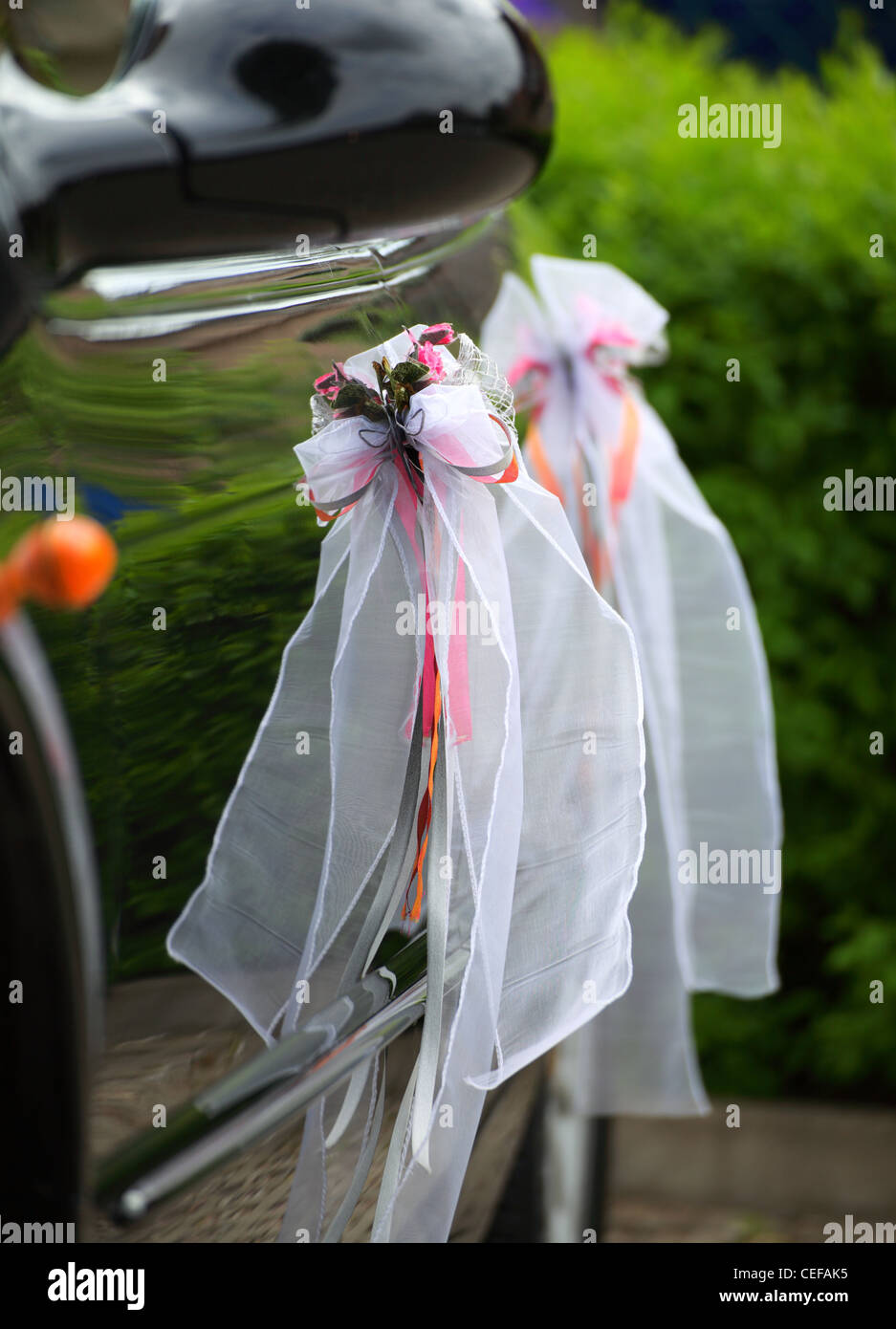 The black elegant car for a wedding celebration Stock Photo - Alamy