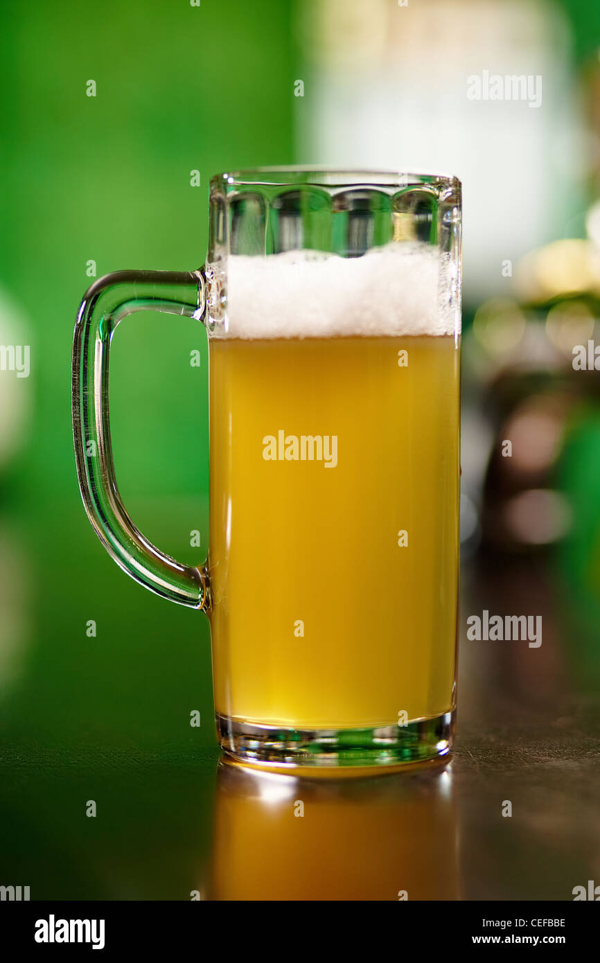 Image of glass of beer on pub table Stock Photo - Alamy