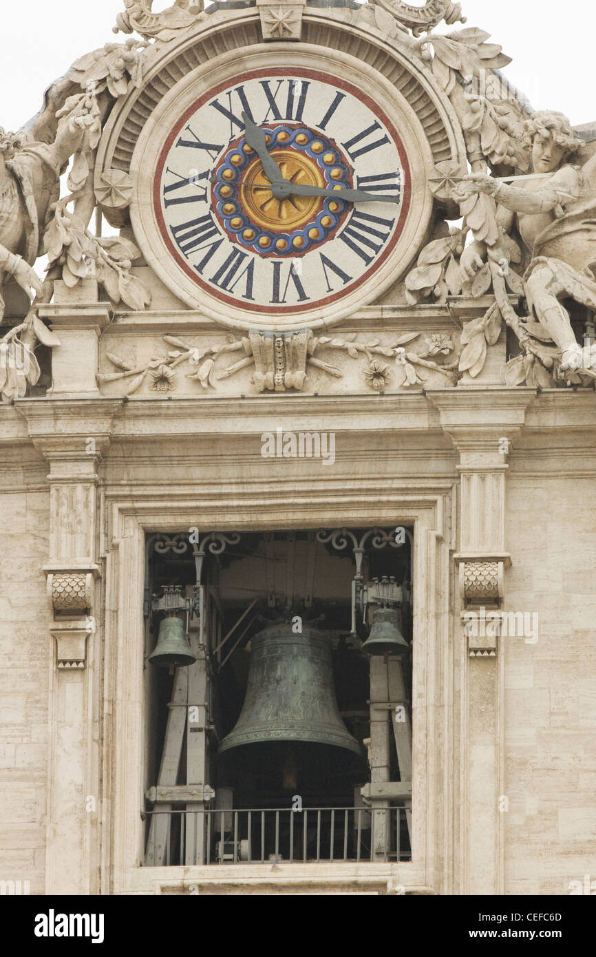 The bell tower and clock outside the Papal Basilica of Saint Peter Saint Peter's Basilica Rome ...