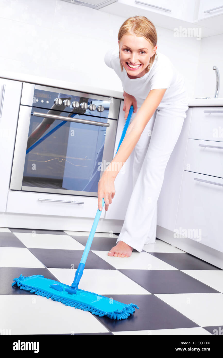 happy beautiful housewife cleaning the house Stock Photo - Alamy