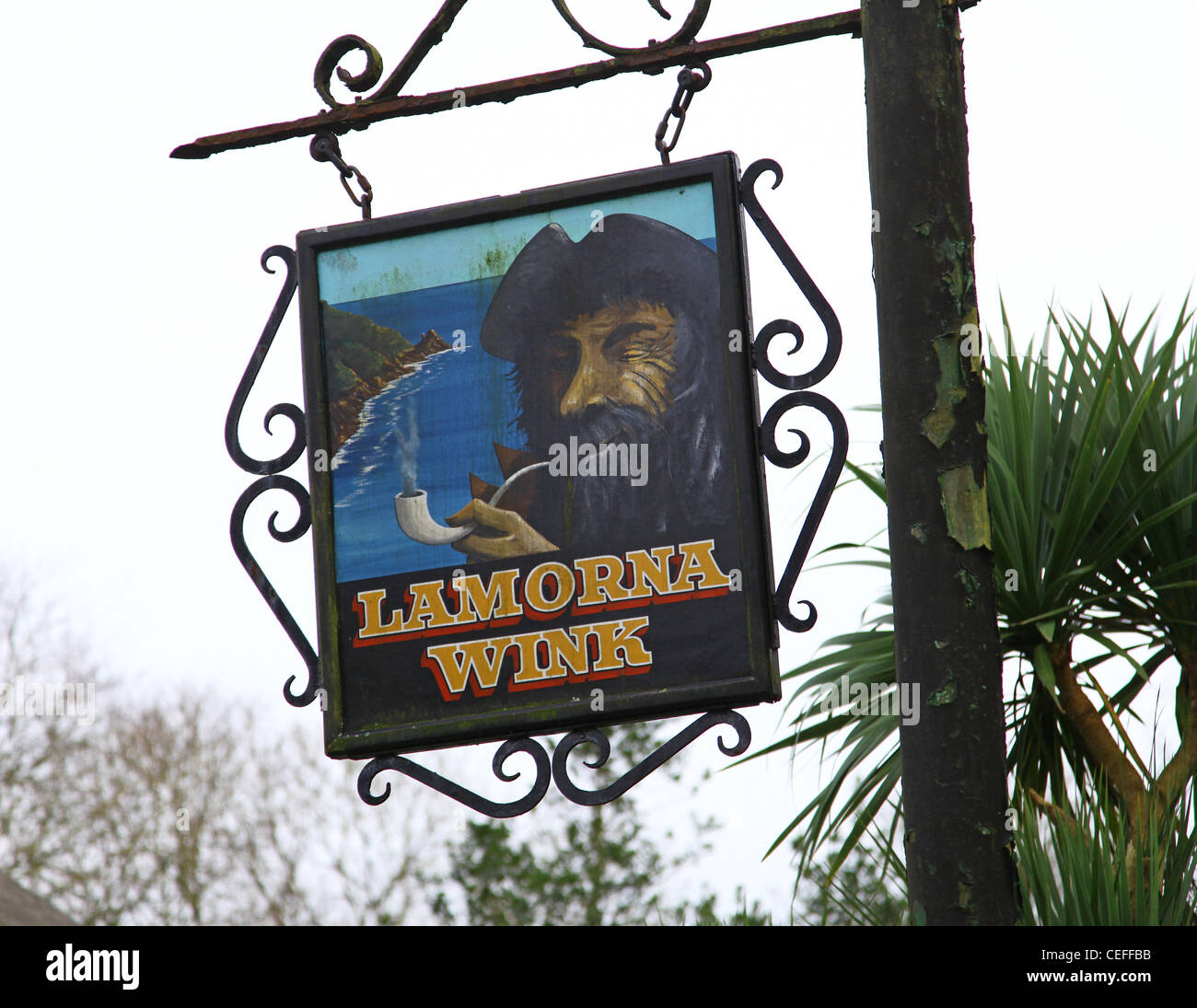 Sign outside the Lamorna Wink pub, Lamorna Cove, alludes to smuggling ...