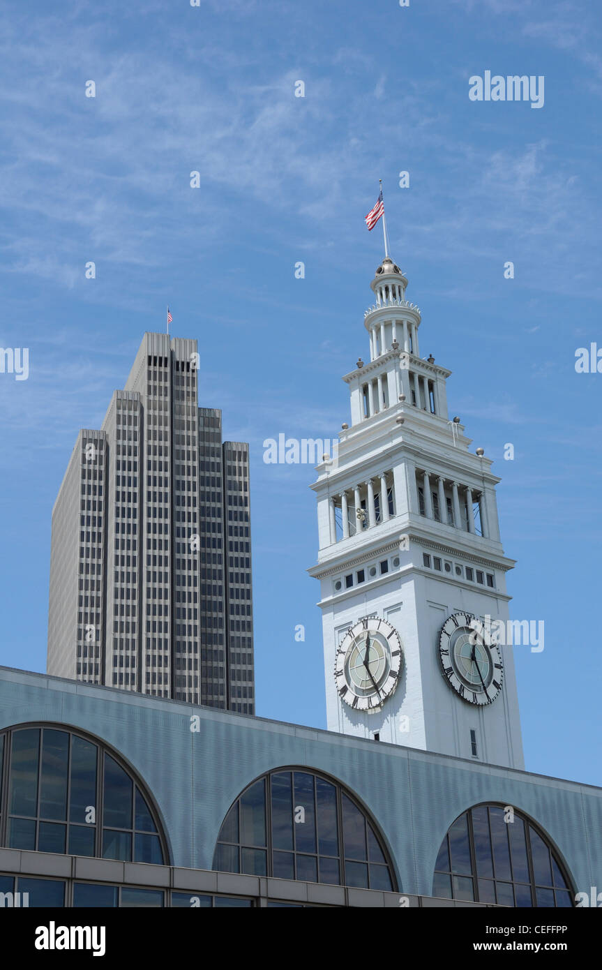 Clock Tower of the Ferry Building with skyscraper behind, Embarcadero ...