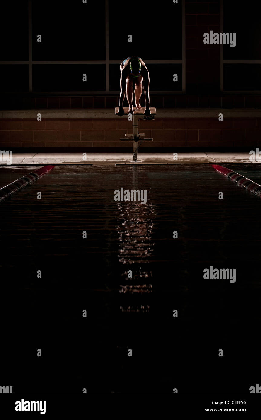 Swimmer poised dive pool hi-res stock photography and images - Alamy