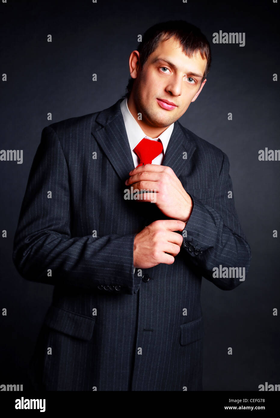 handsome young businessman ,wearing a costume Stock Photo - Alamy