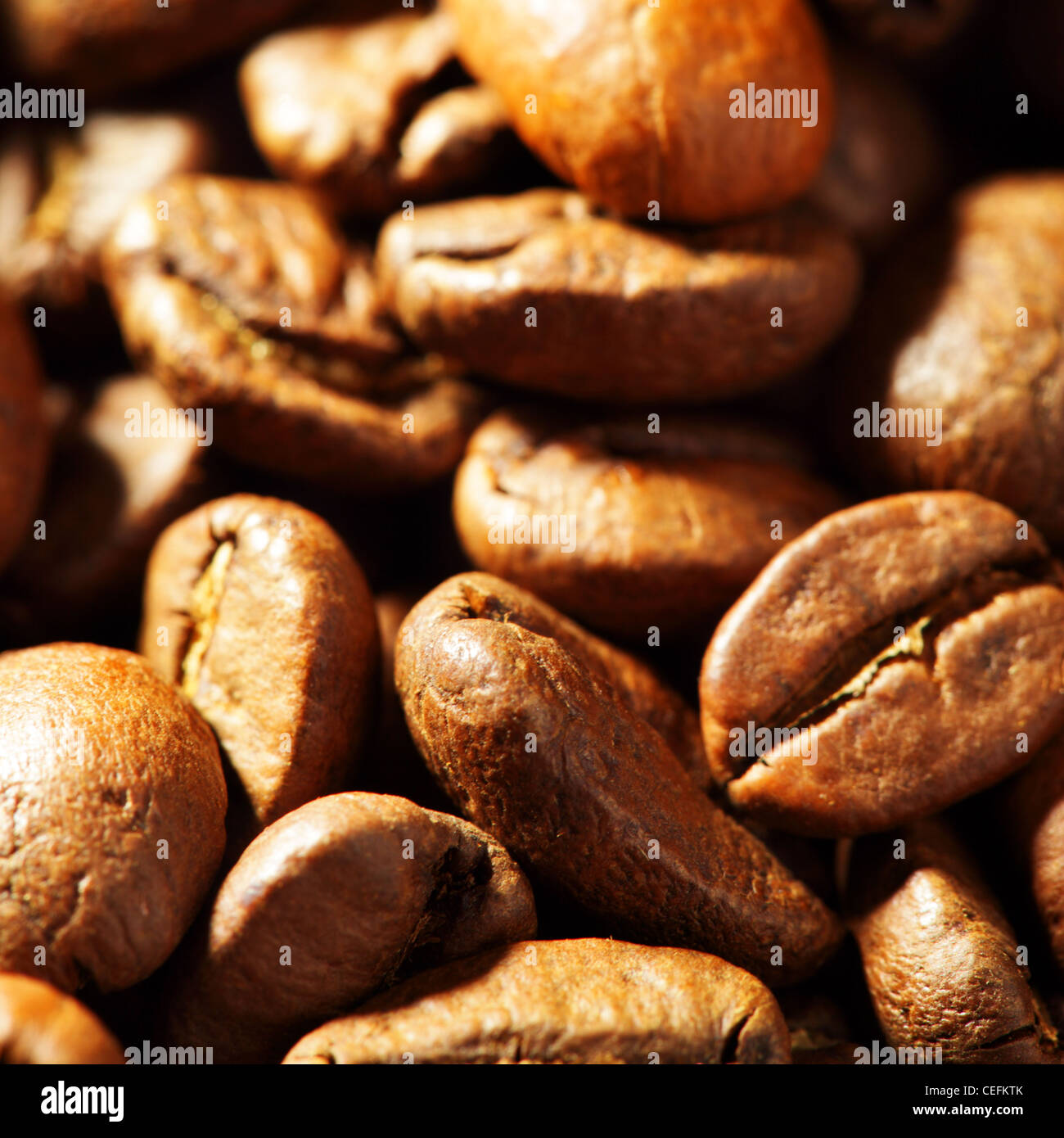 Coffee beans close-up, may be used as background Stock Photo - Alamy