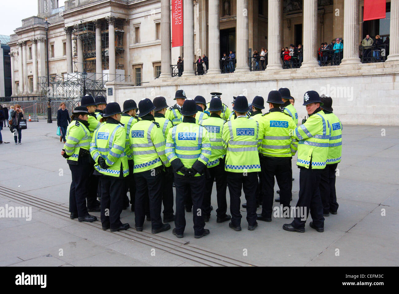 Police receive an open air briefing as part of Operation Impact ...