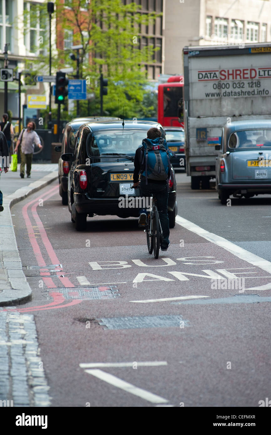 Rear view of traffic in the centre of the City of London, England Stock ...