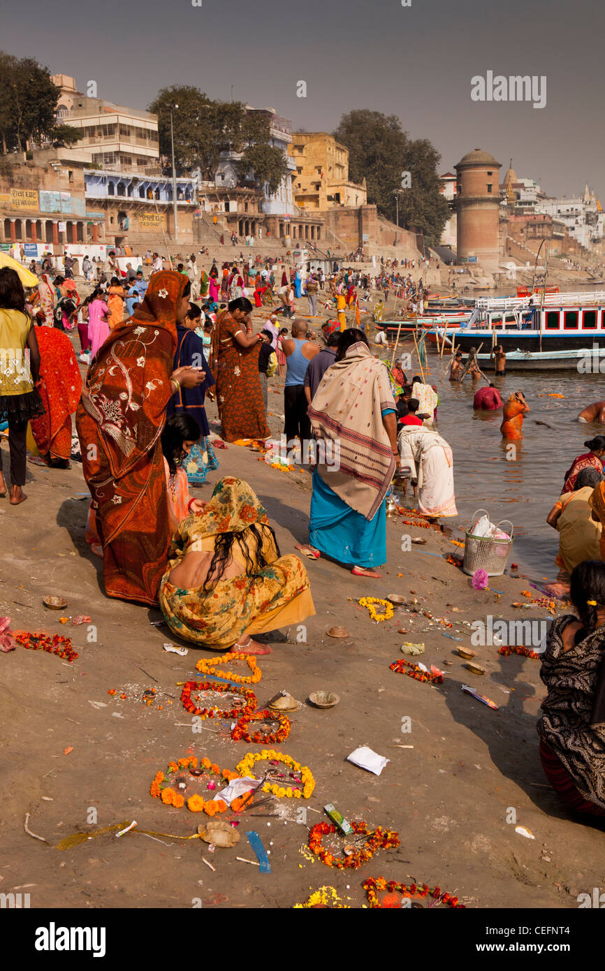 India, Uttar Pradesh, Varanasi, Gangamahal Ghat, brightly dressed ...
