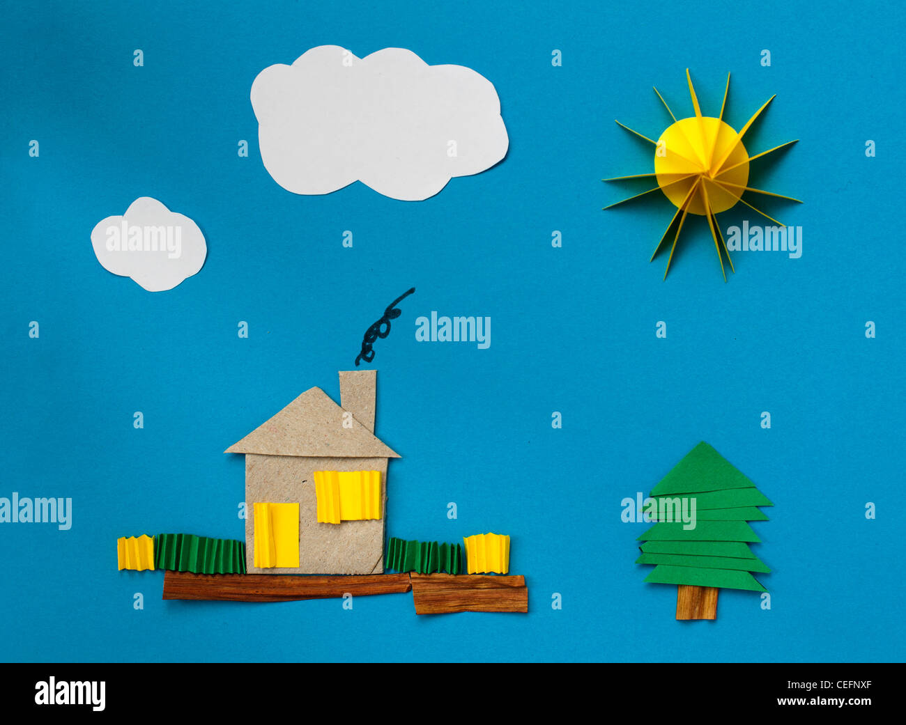 House made of paper over blue paper background Stock Photo - Alamy