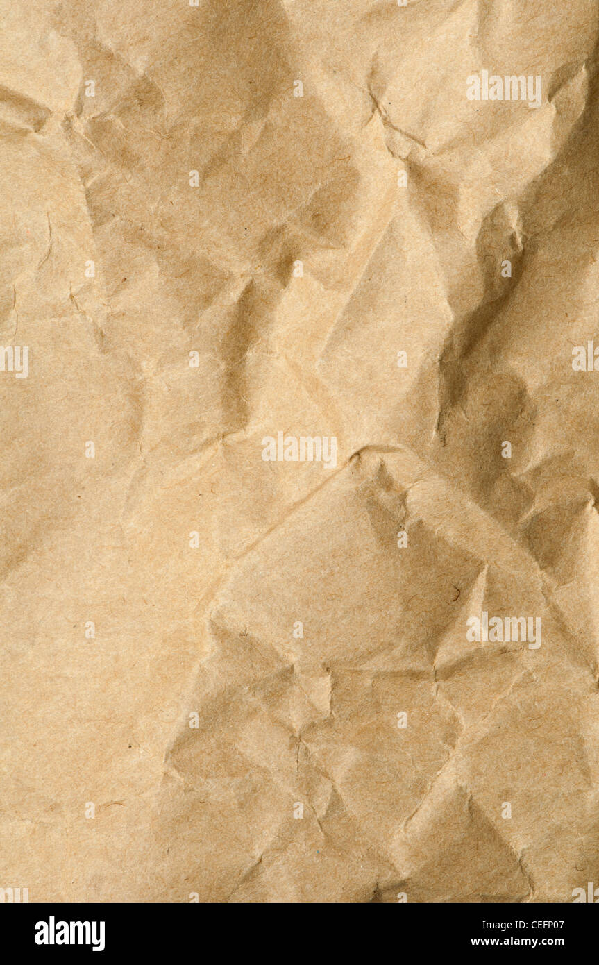 Crumpled paper beige texture Stock Photo - Alamy
