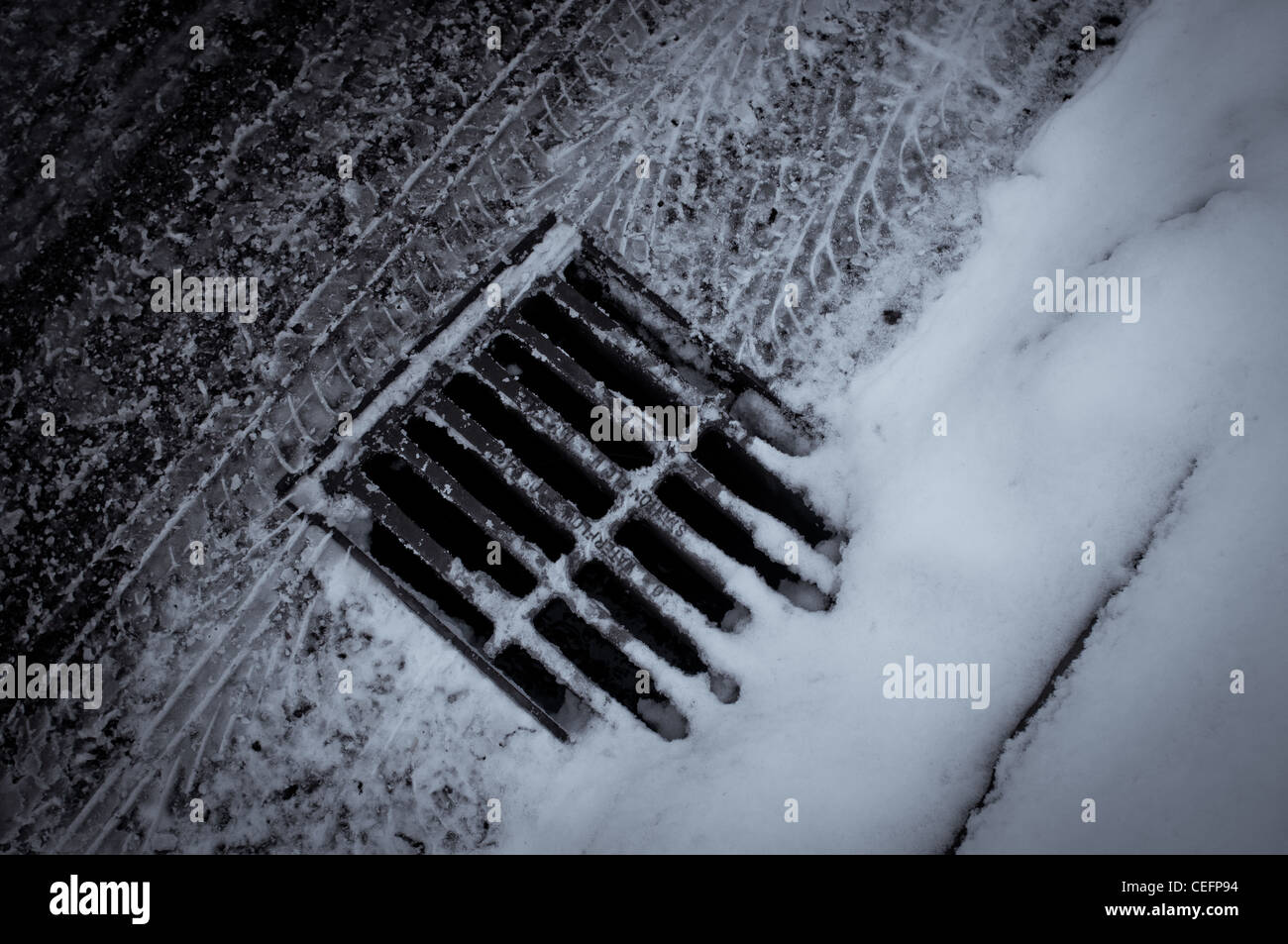 A water drain in the snow Stock Photo - Alamy