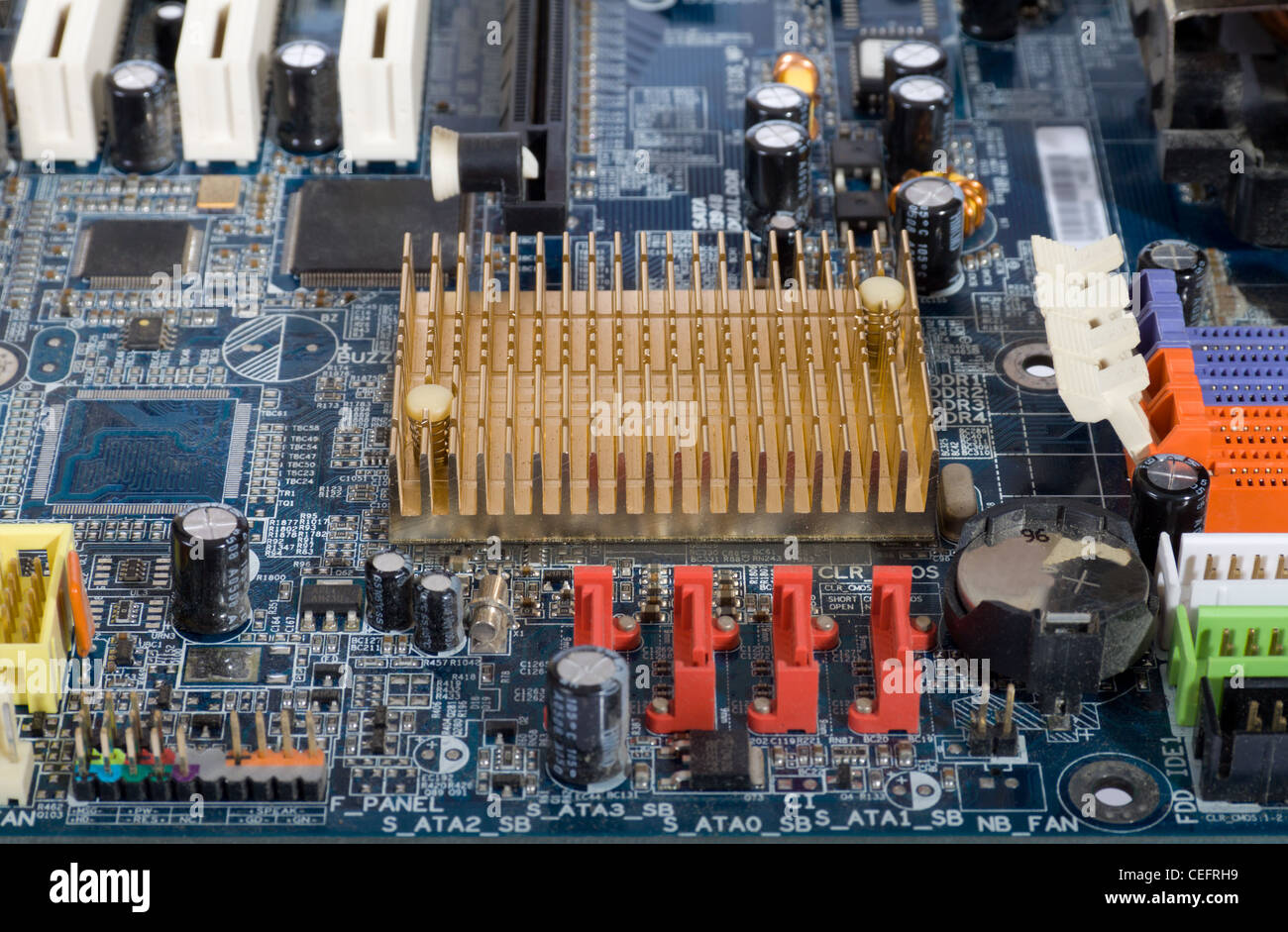Computer mainboard with lots of electronic components Stock Photo - Alamy