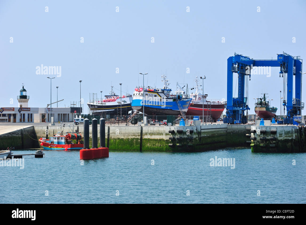 Trawler fishing boats on shipbuilding yard for maintenance works in the ...