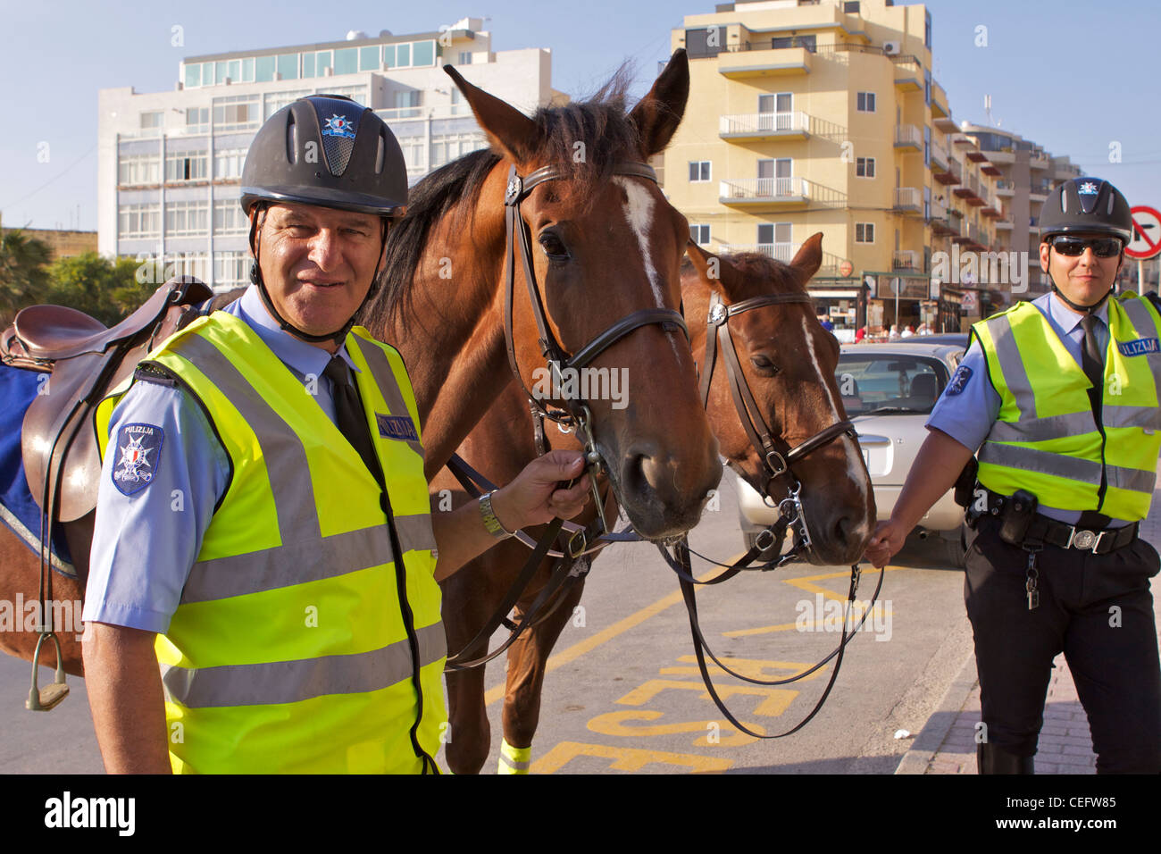 Two Maltese police (Polizija) from the mounted branch on patrol in ...