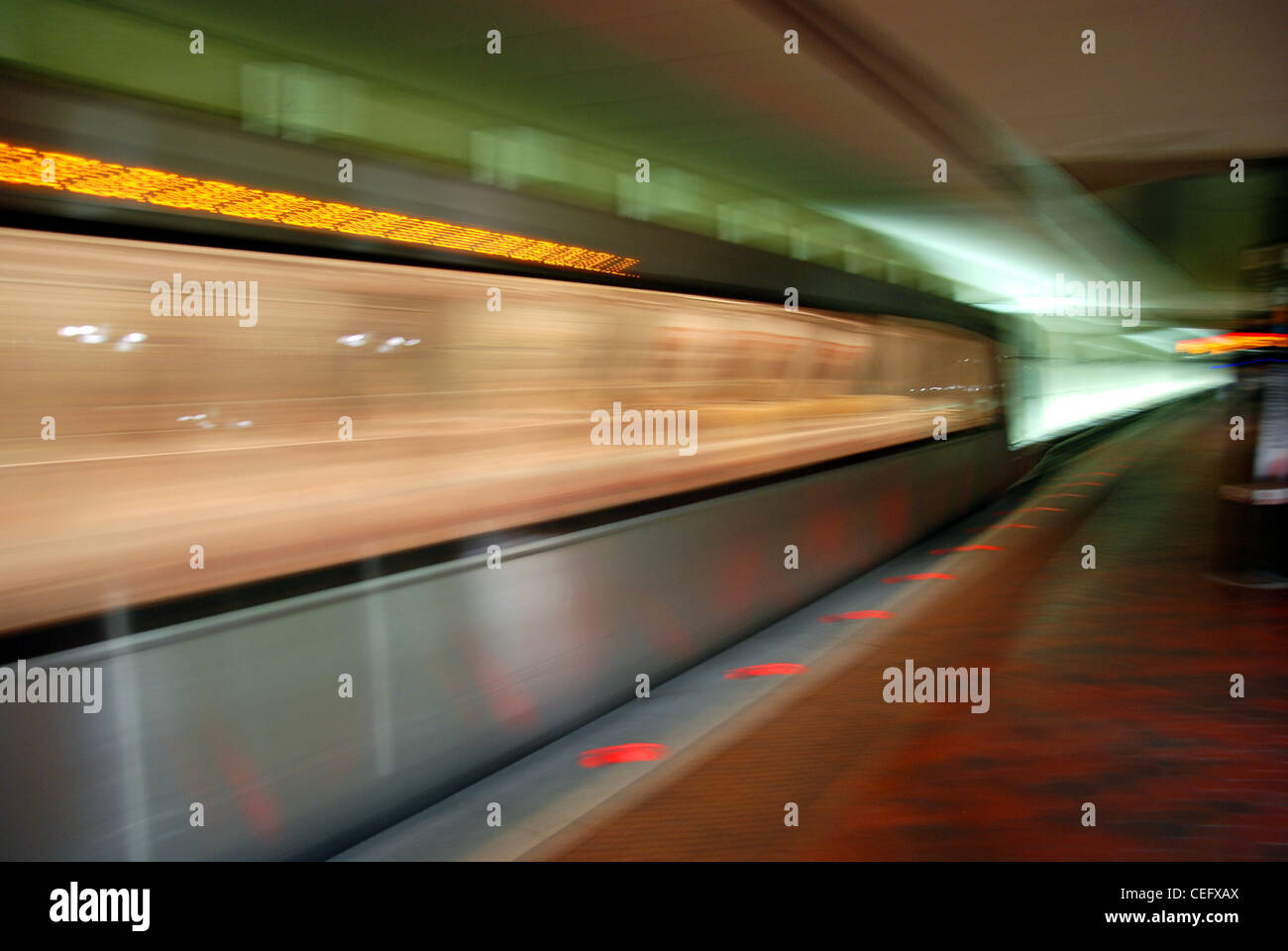 Blurred metro unit in motion Stock Photo - Alamy