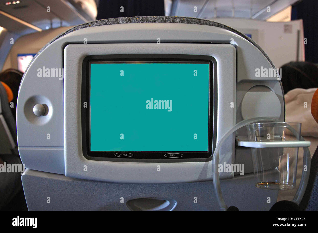 Seat monitor with blank screen in plane Stock Photo - Alamy