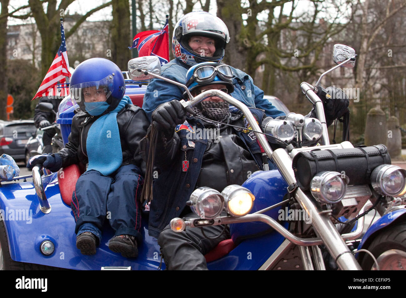Family in a motorbike Stock Photo - Alamy