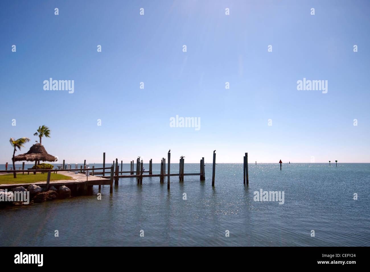 A grass canopy and sea view on a scenic pier Stock Photo - Alamy