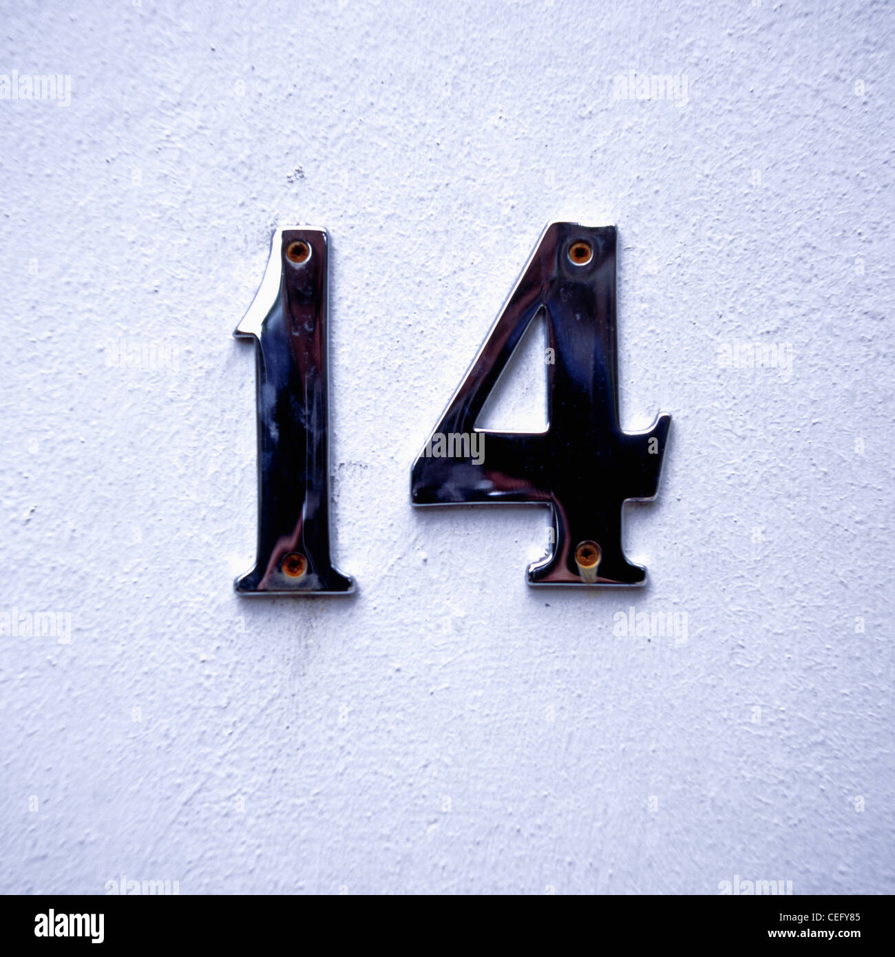 Close up of 14 house number Stock Photo - Alamy