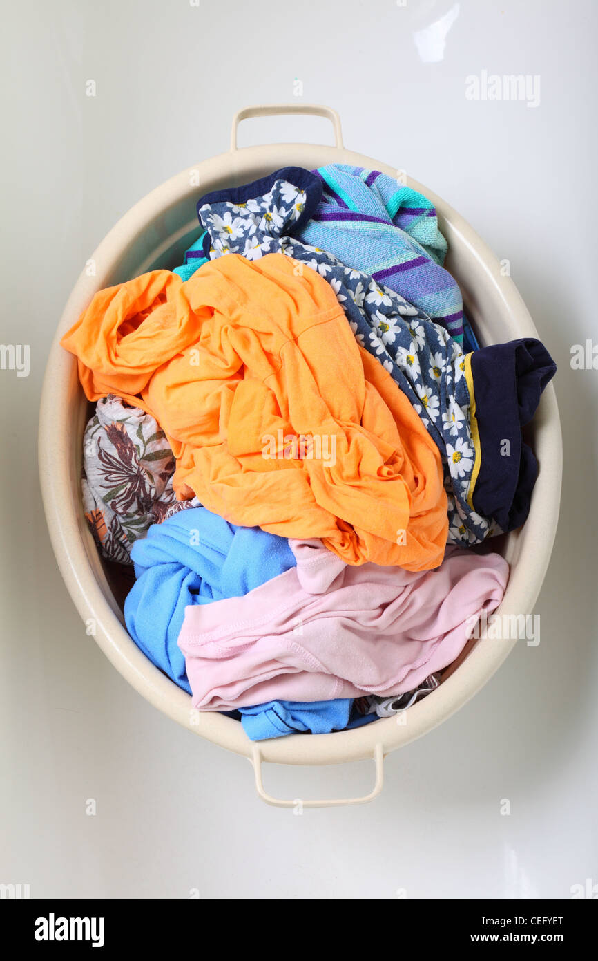 Pile of dirty laundry in bath washing machine green bathroom Stock ...