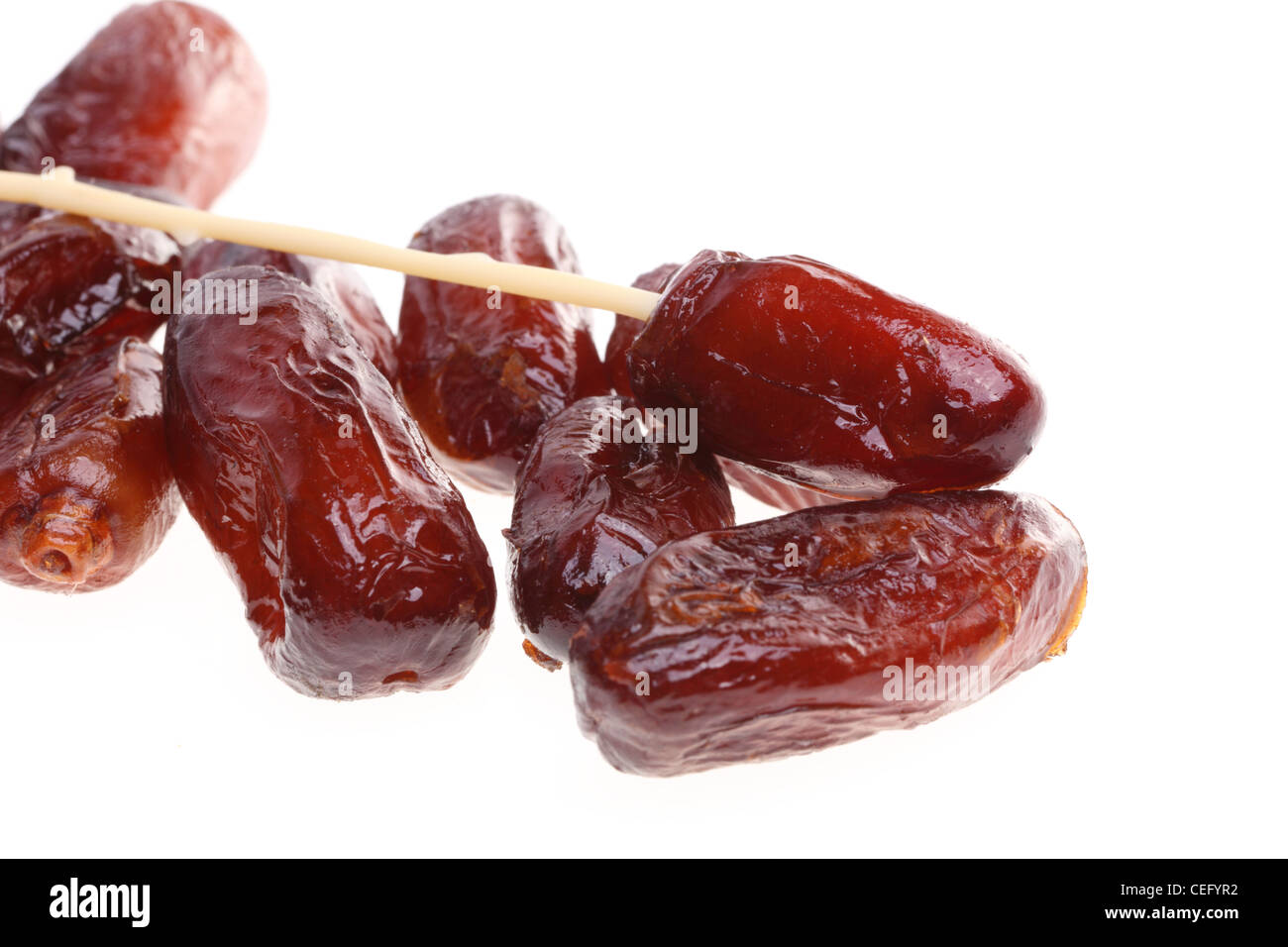 Dried date fruits isolated on white background Stock Photo - Alamy